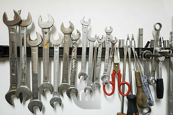 Bildagentur | mauritius images | Close-up of work tools on magnet at ...